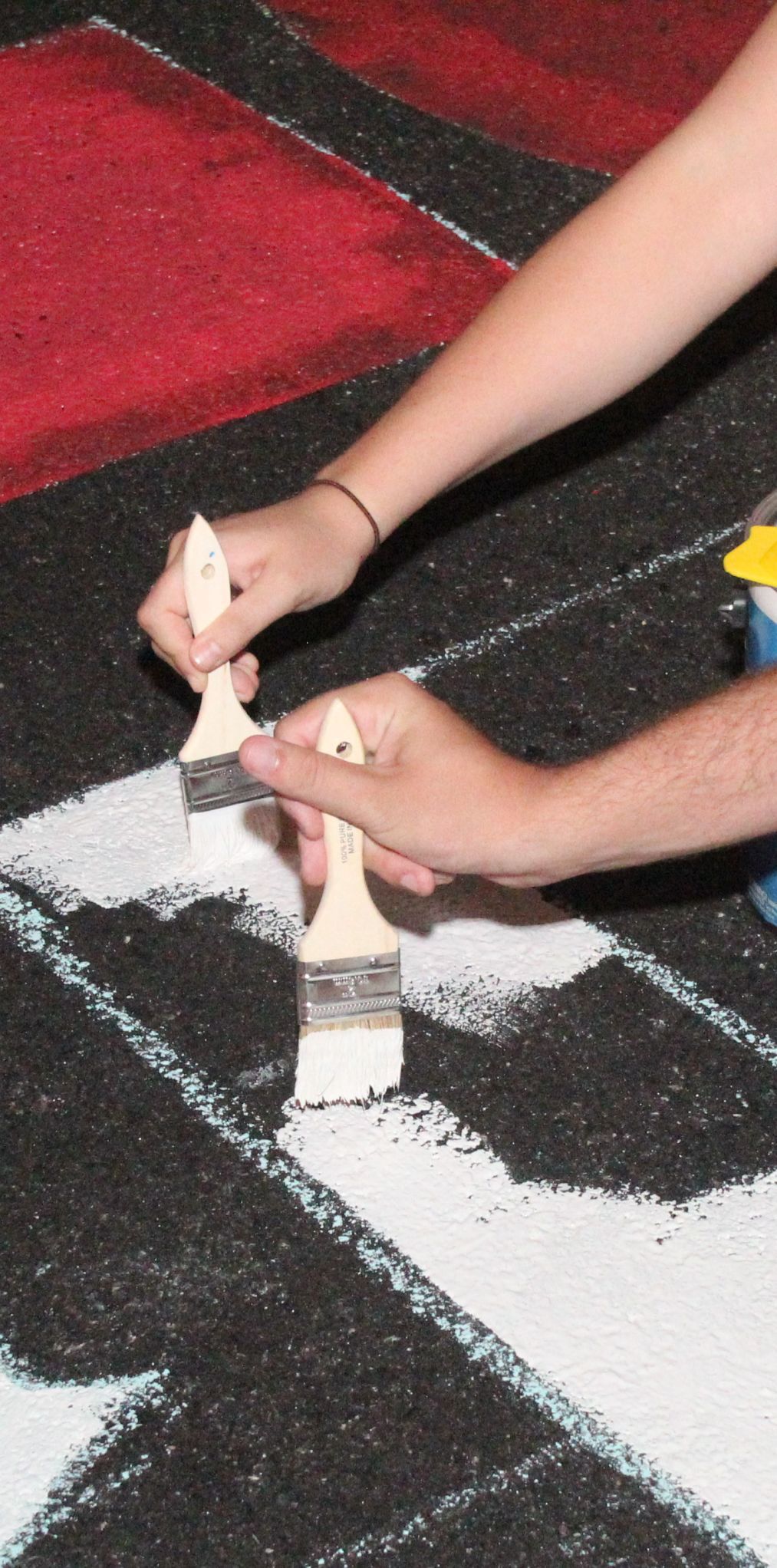 Painting the Quad-City Times Bix 7 logo | Local News | qctimes.com