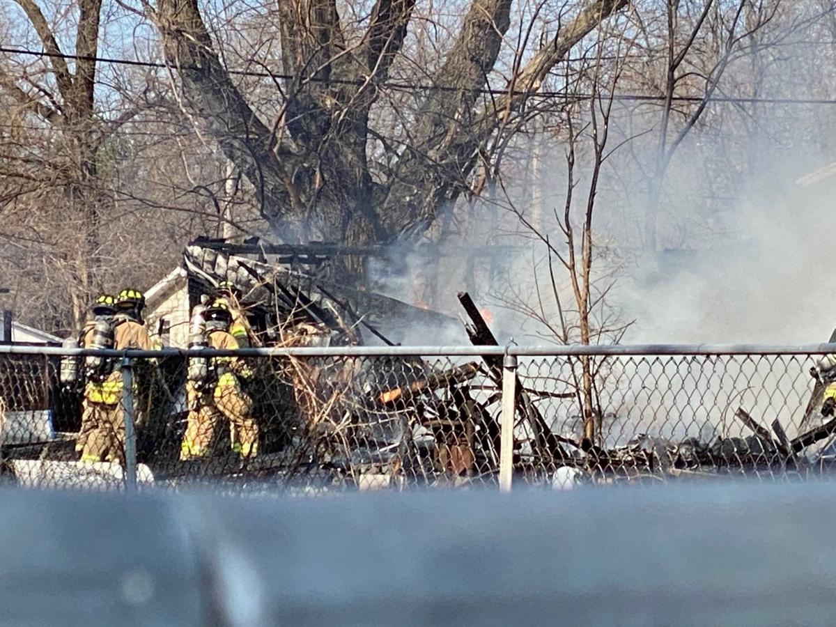 Firefighters work garage fire in Moline