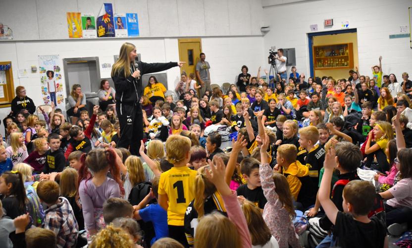 IOWA WOMEN'S BASKETBALL: Martin stars in visit to Blue Grass Elementary