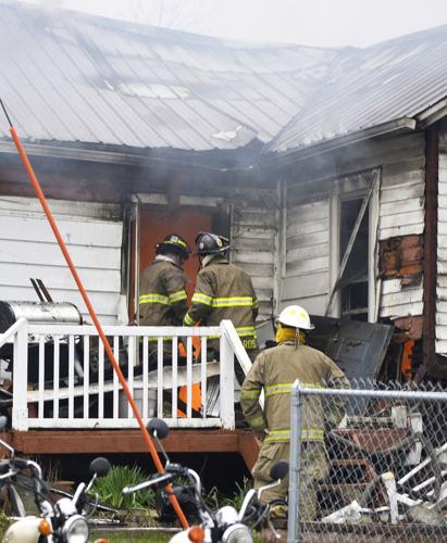Muscatine firefighters battle house fire