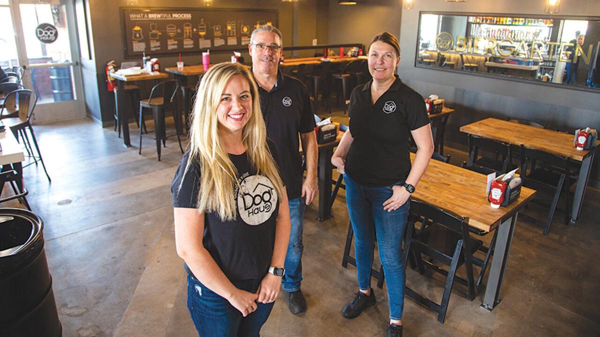 QC couple celebrate opening of Dog Haus | News | queencreektribune.com