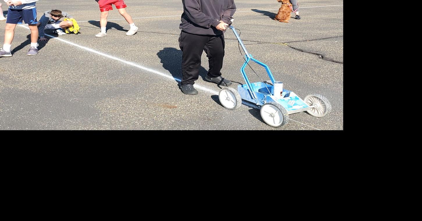 Student initiative results in new football field on the WMS playground ...