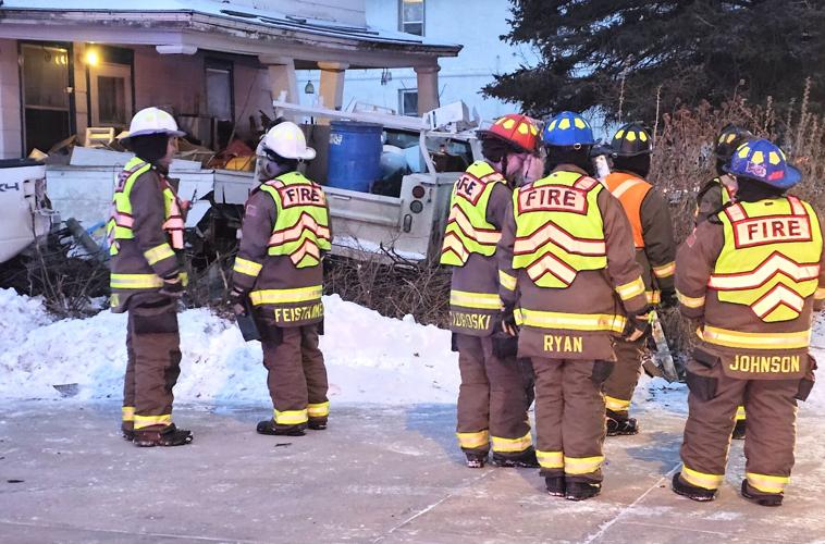 Half-ton work truck collides with parked pickup truck, house | News ...