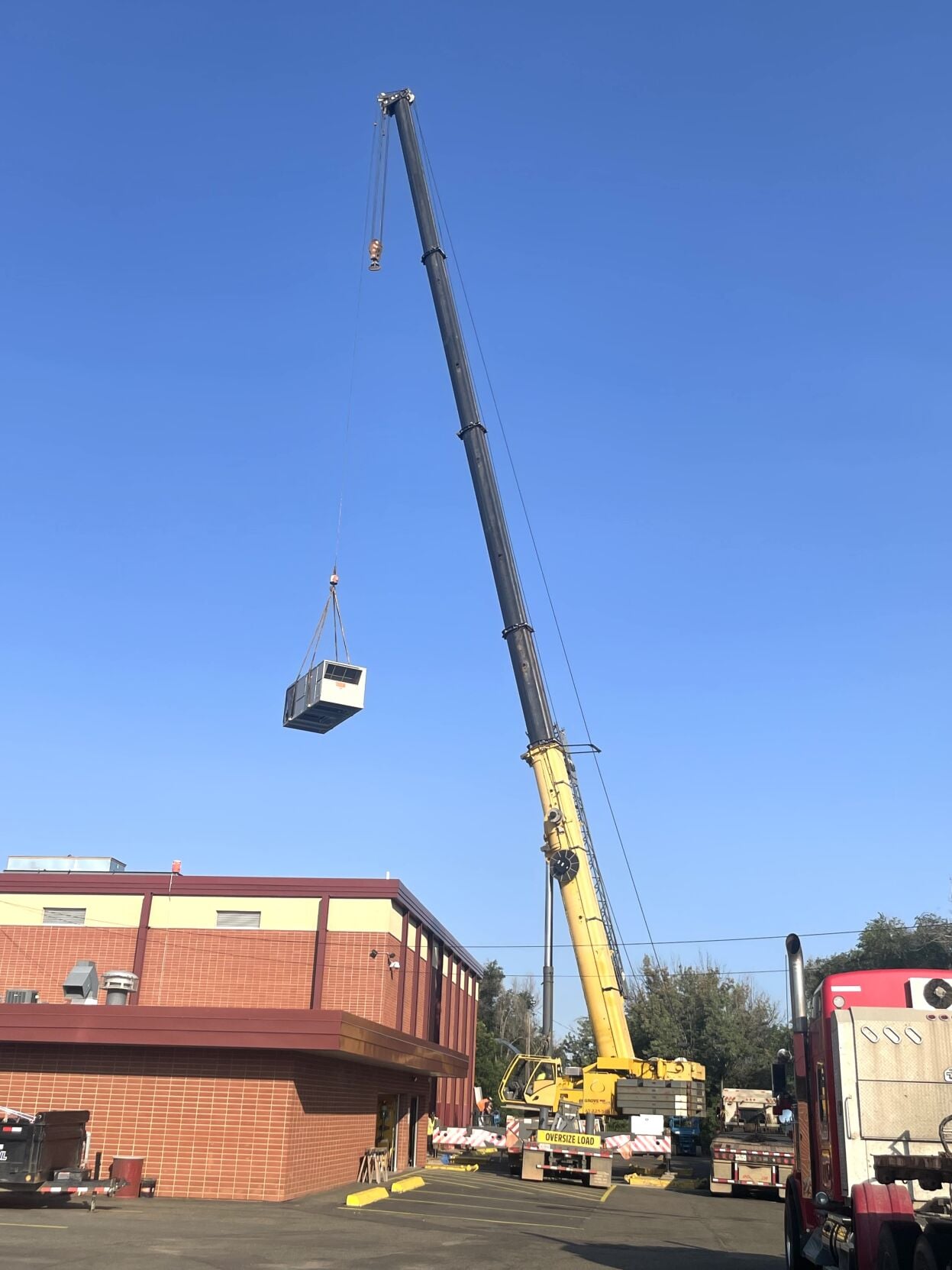 Crane lifts DCHS closer to new heating and cooling system | Hydrography ...