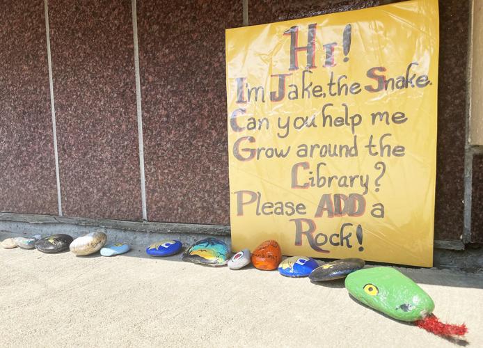 Painted rocks around the Glendive Public Library promote local artists ...