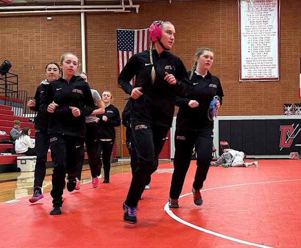 Ackerman sisters carry family tradition onto the wrestling mat | Sport ...
