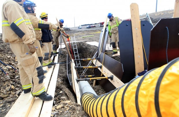 Firefighters practice below ground rescue