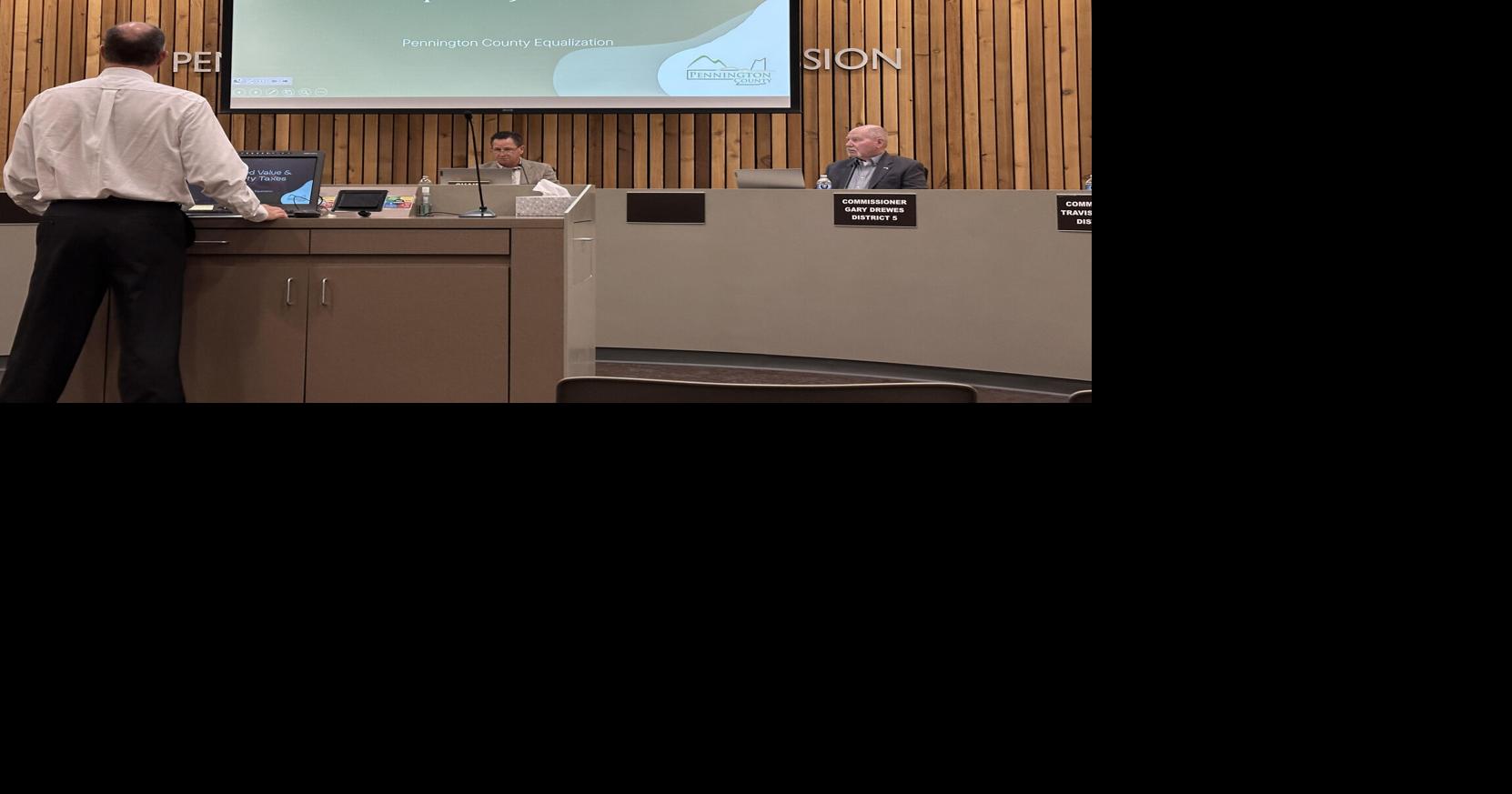 County property assessment formula presented to commission