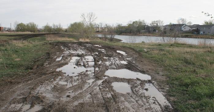 Mud boggers making a mess of Rapid Valley pond