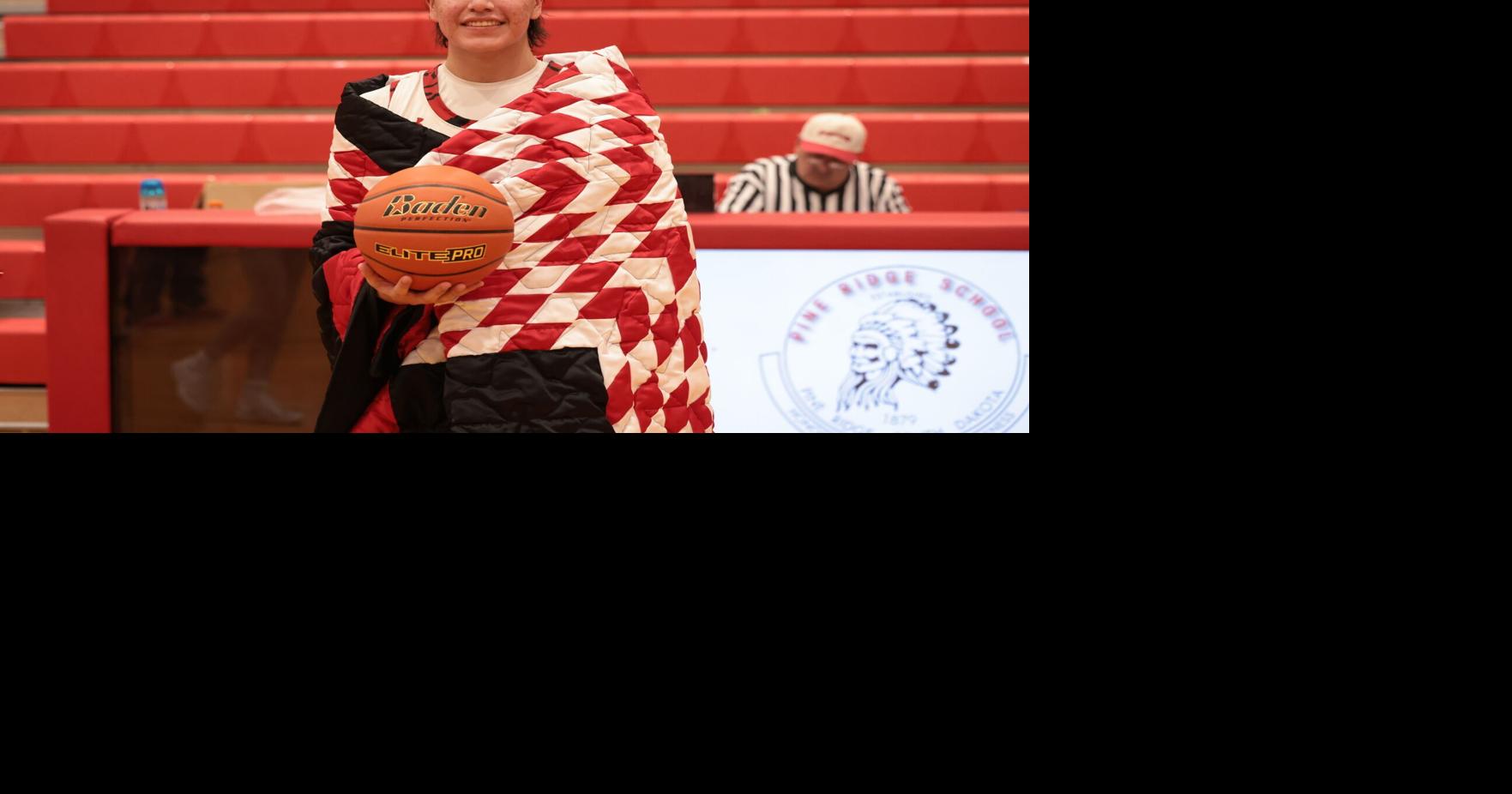 PHOTOS: Marvin Richard III makes South Dakota hoops history