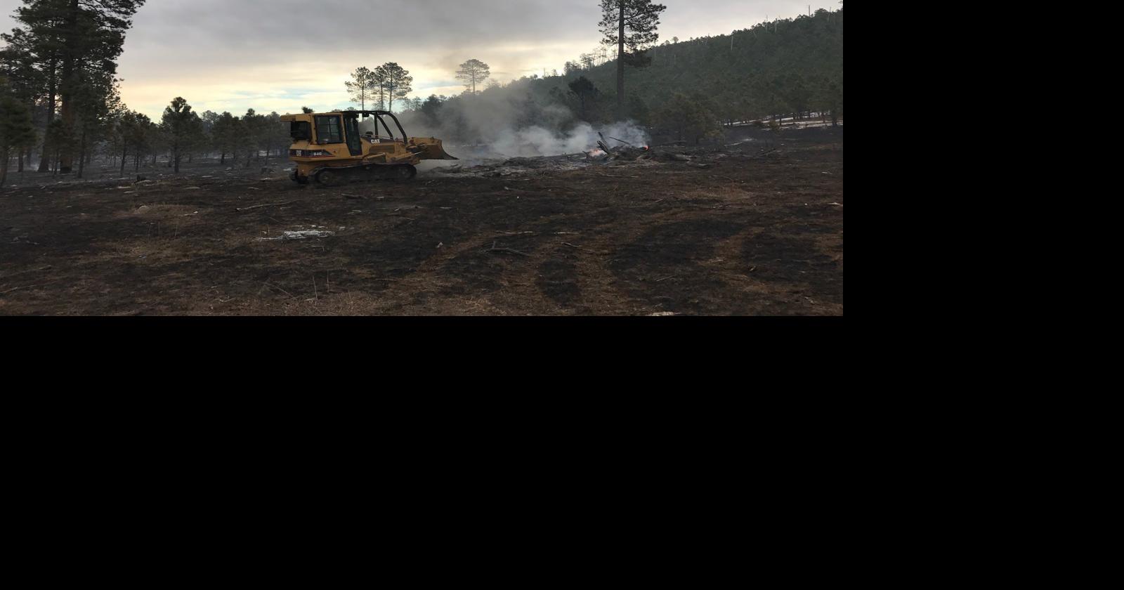Slash pile embers blow into wildfire in Custer State Park