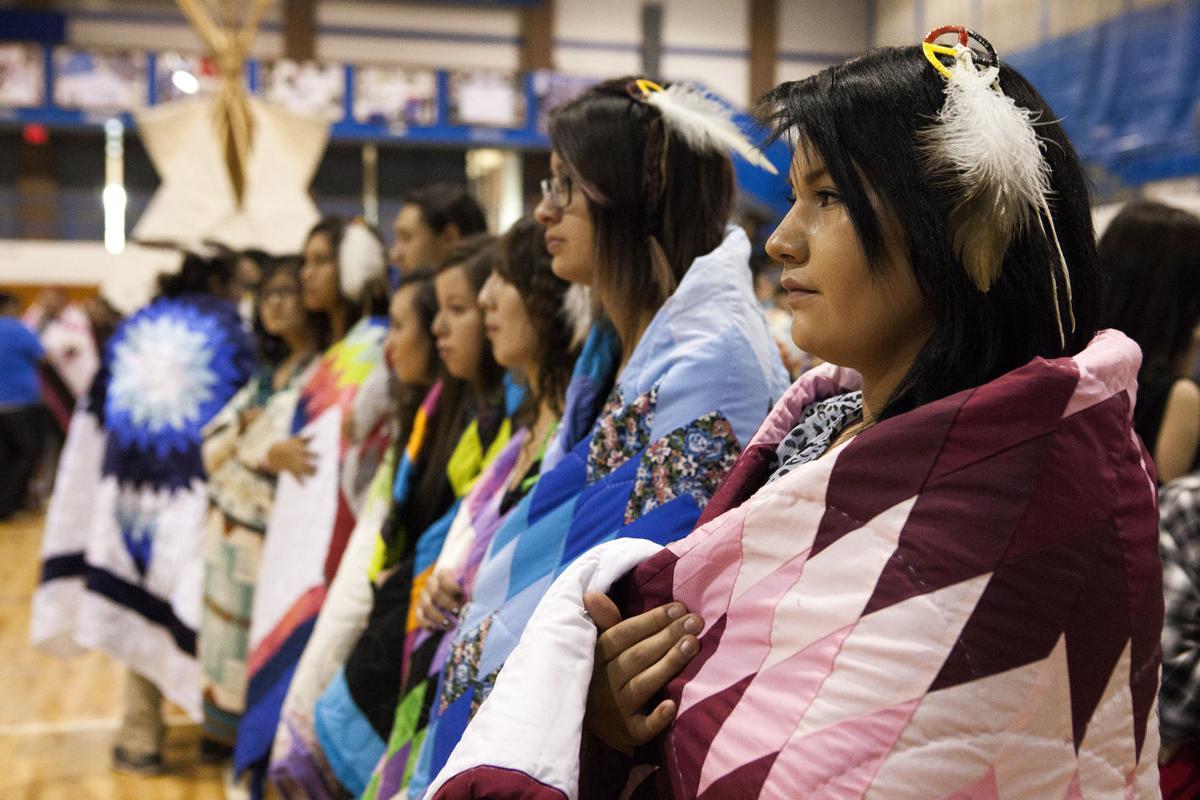 Feathering ceremony for Native American graduating seniors