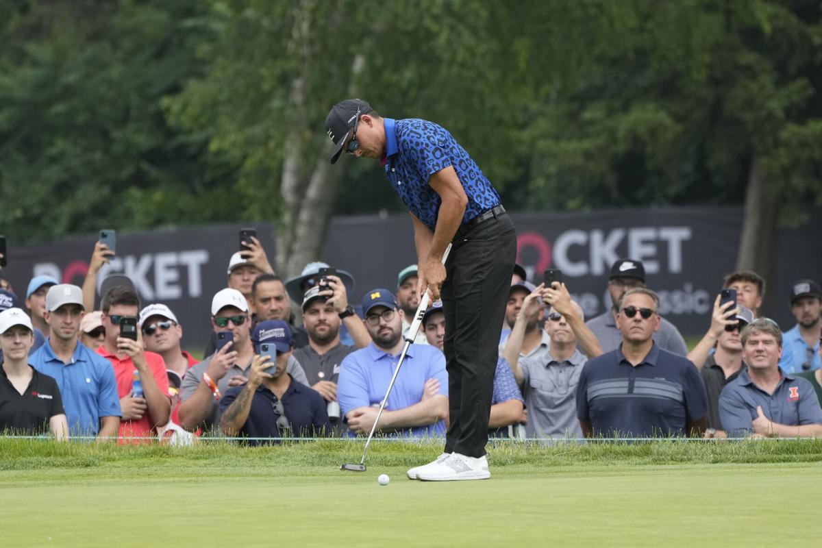 Rickie Fowler leads the Rocket Mortgage Classic at 20 under