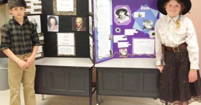 Students participate in living wax museum project