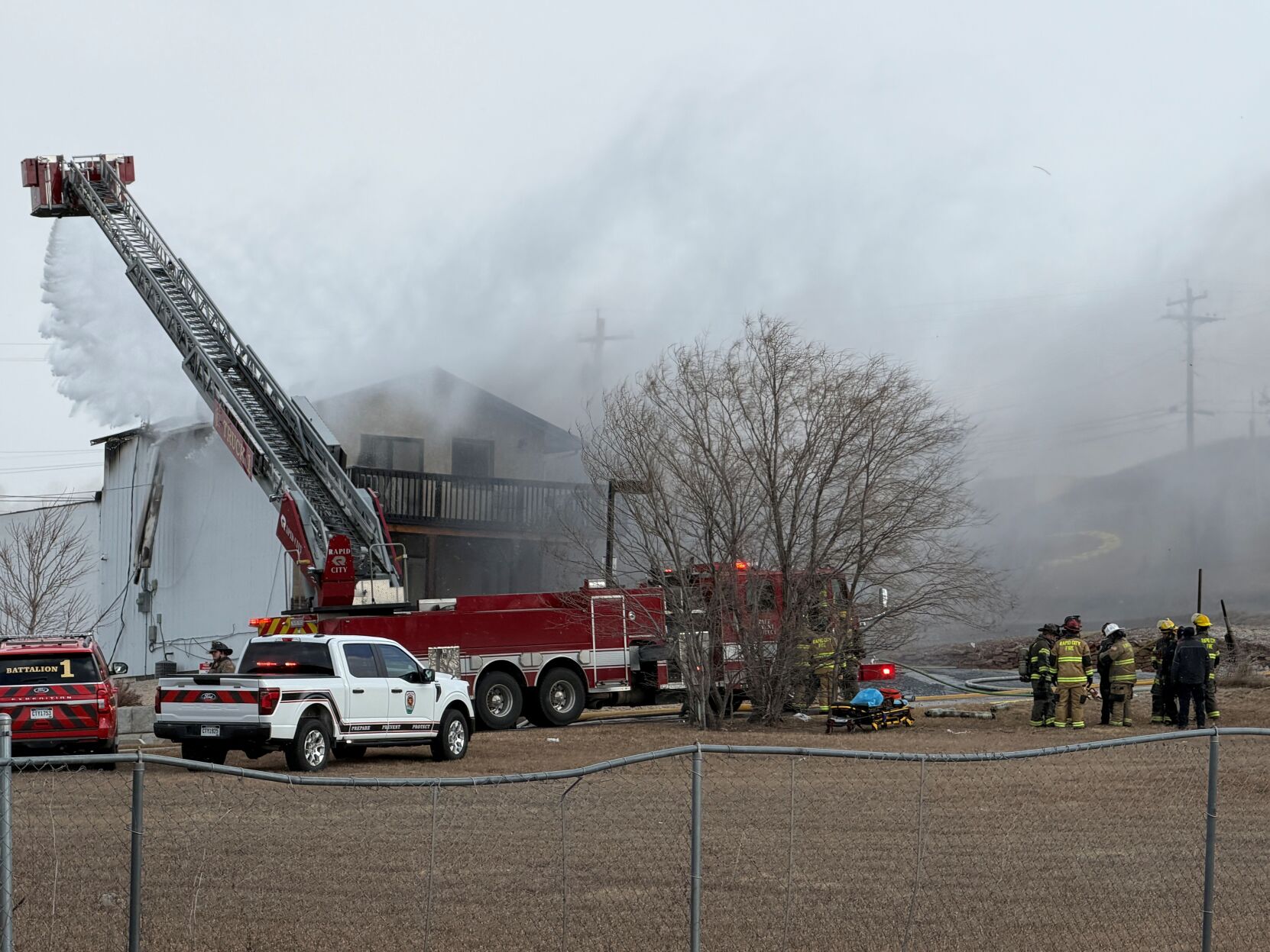 PHOTOS: Rapid City crews battle fire on Wright Street