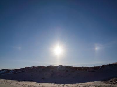 Defining the 'sun dog' and how they appear in the sky, even at night