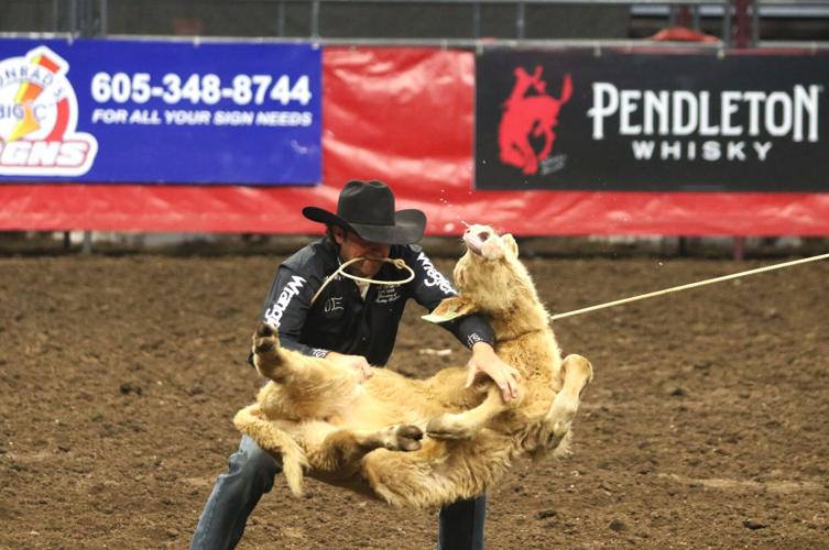 Missouri, Idaho cowboys take top spot in tie-down roping slack at Rodeo ...