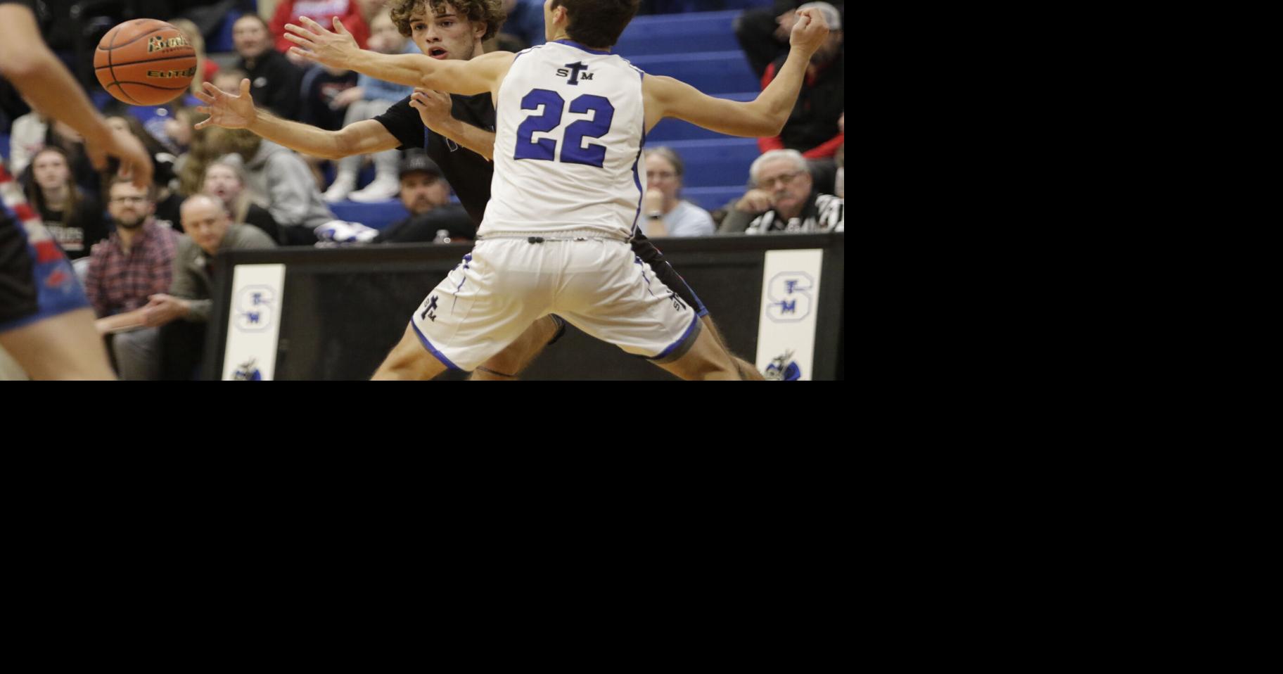 PHOTOS: Action between the St. Thomas More boys basketball and Douglas