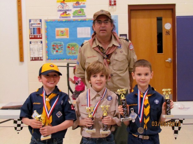 Cub Scouts race in Pinewood Derby