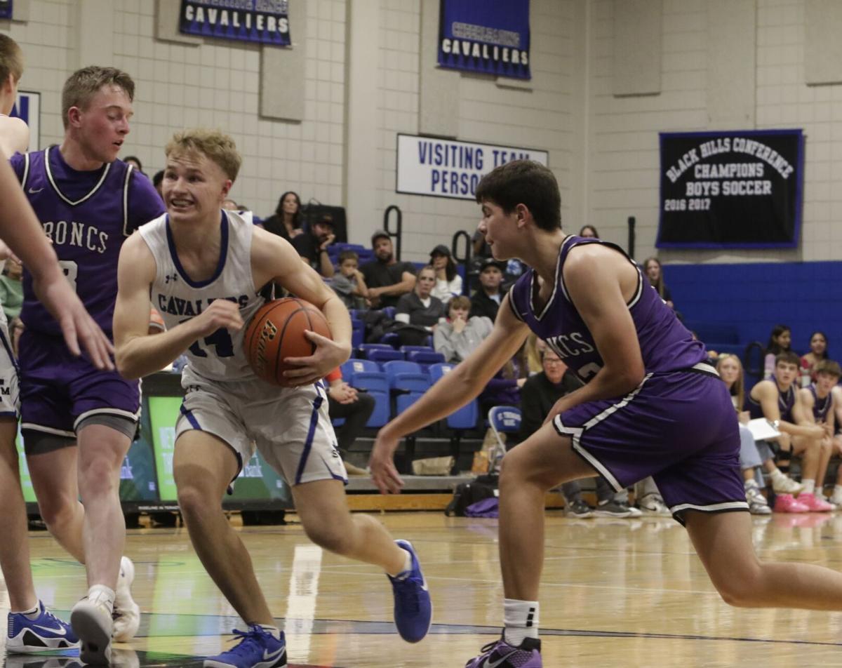 PHOTOS: St. Thomas More boys basketball reigns victorious in win
