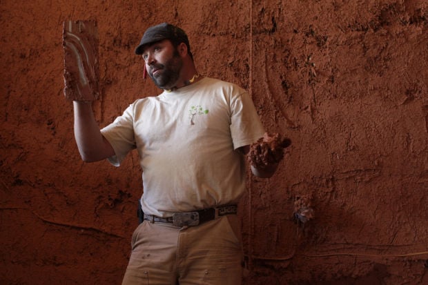 Building with bales: Couple create straw house to live off the grid ...