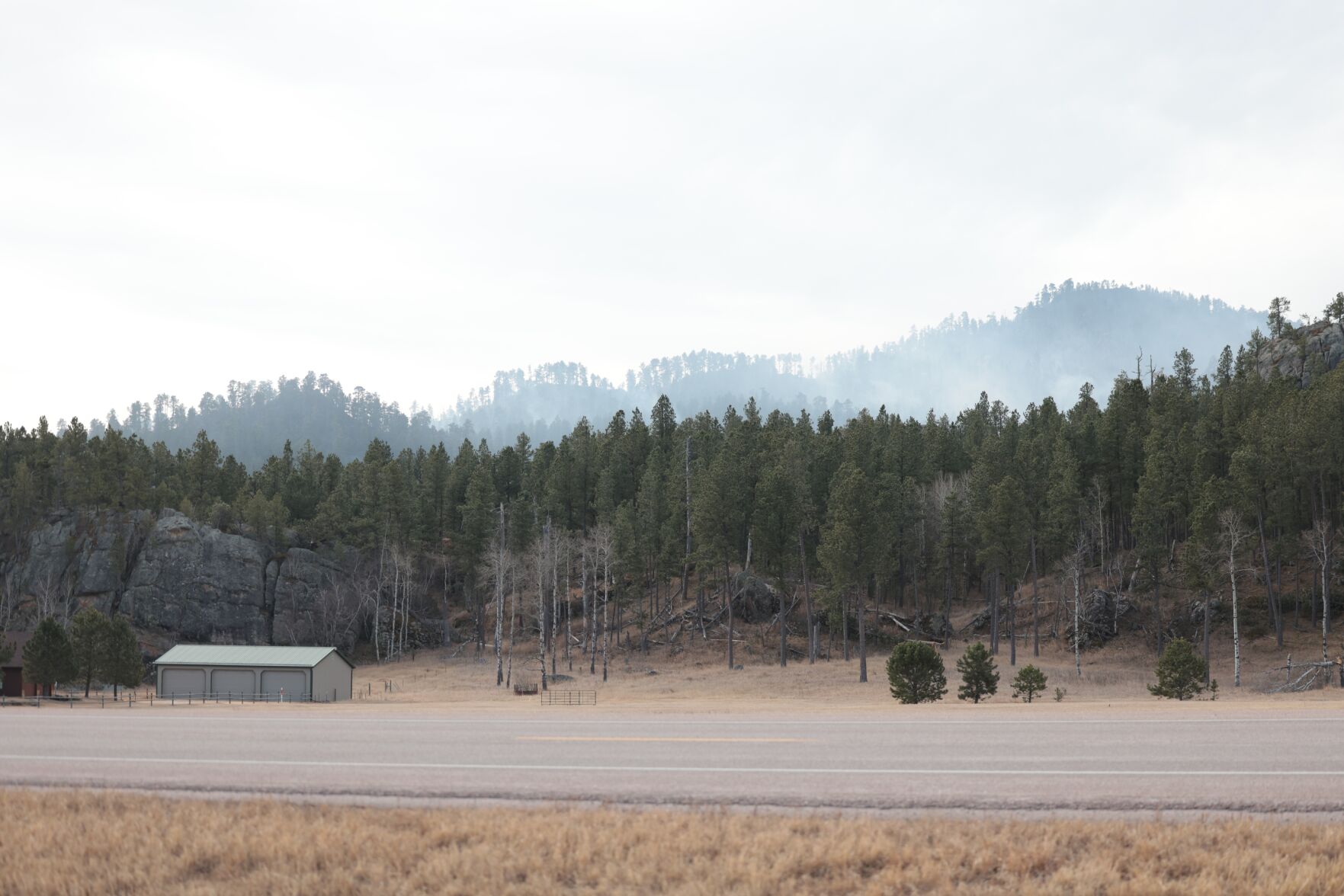 Photos from the Qury wildfire as work continues near Custer