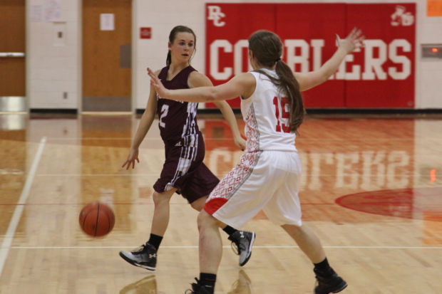 High school basketball: Engesser leads Spartans past Cobblers