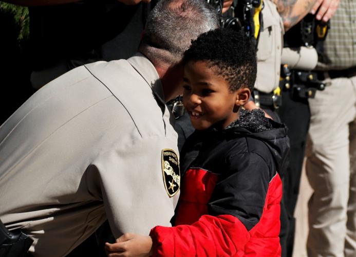 12-year-old hugs law enforcement across United States