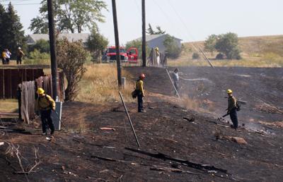 Monday grass fire human caused, RCFD says