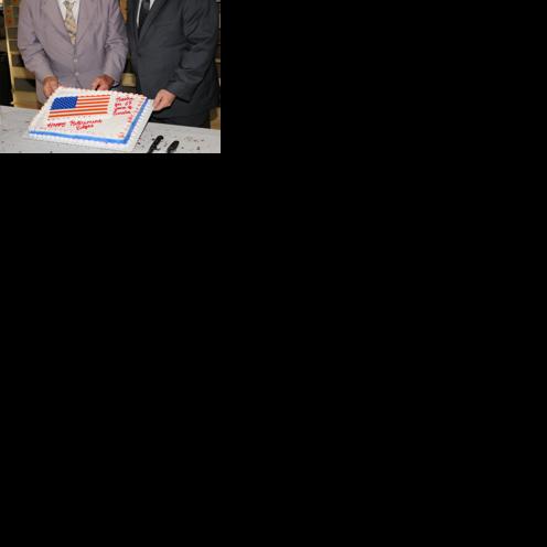 Redig 'retiring' postmaster recognized by post office officials