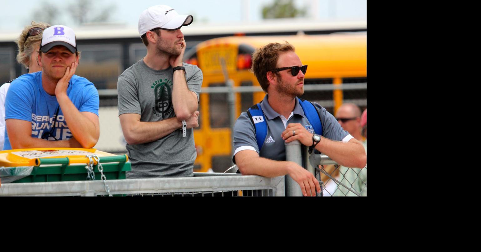 Matt and Jesse Coy, brothers, coaches on the cross country course