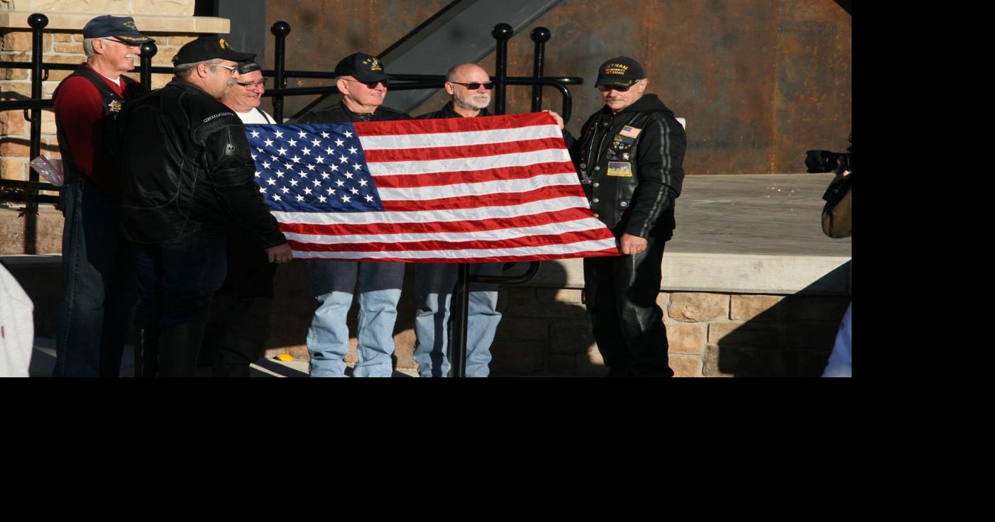 Daugaard speaks at christening ceremony