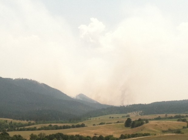 Rain helps with Crow Peak Fire; containment at 5 percent