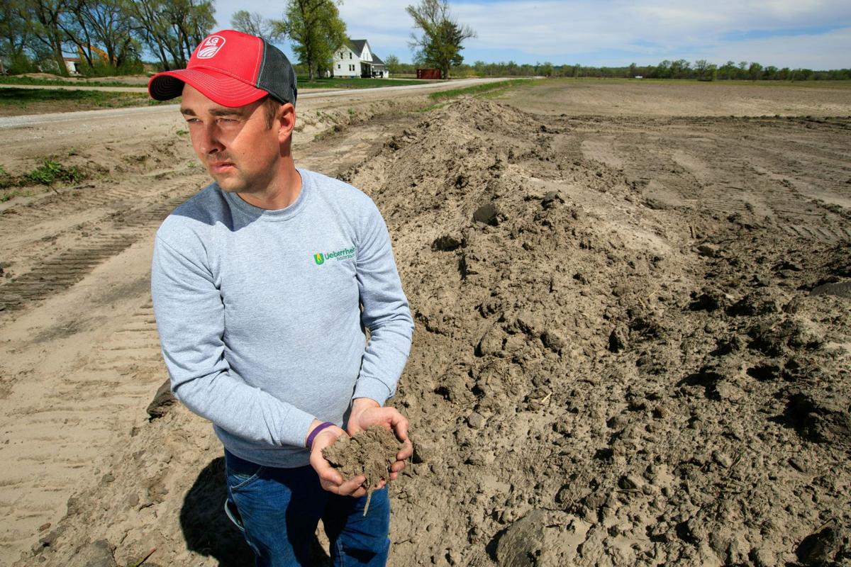 'Mountain of sand' spread across Nebraska farms after floods
