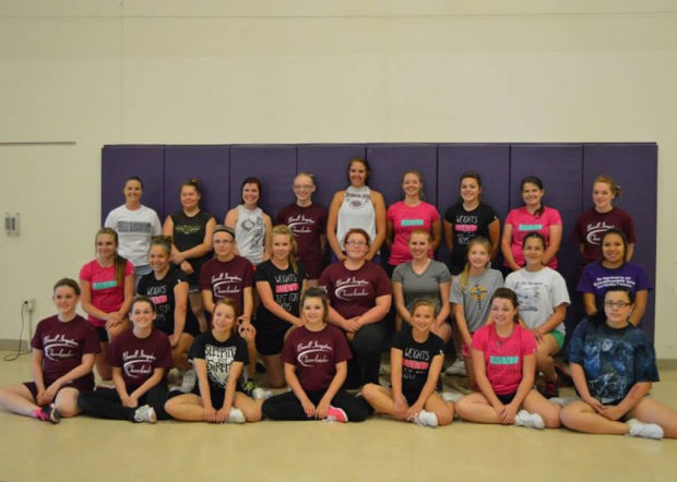 NHS cheerleaders attend camp