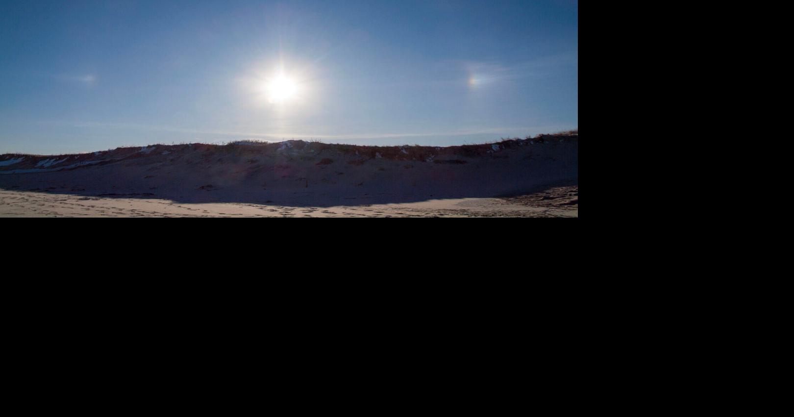 Defining the 'sun dog' and how they appear in the sky, even at night
