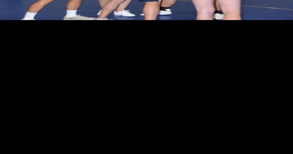 National Champion Cheerleaders work with local Bison cheer squad