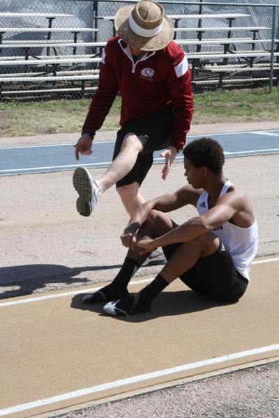 Simpson exceeds 25 feet in long jump