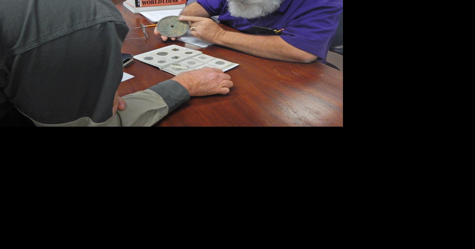 Experts on Asian coins examine local collections