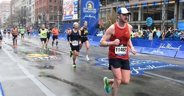 Albin earns medal for six world marathons