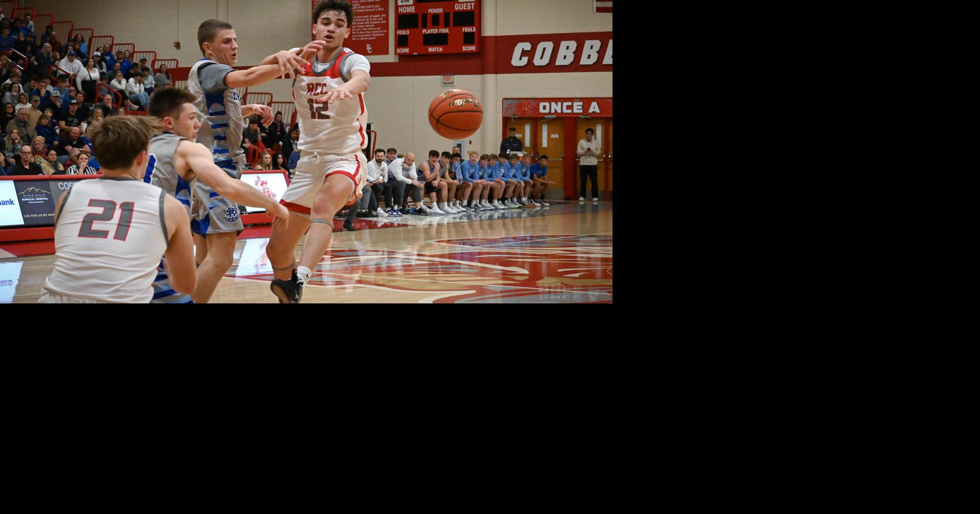 PHOTOS: Stevens boys basketball wins at rival Central