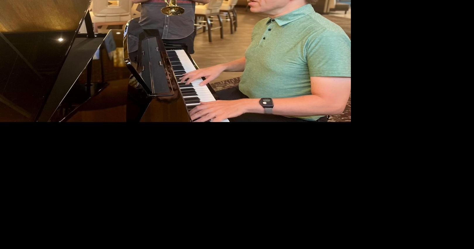 Alex Massa and Tony DeBlois musicians perform in Rapid City