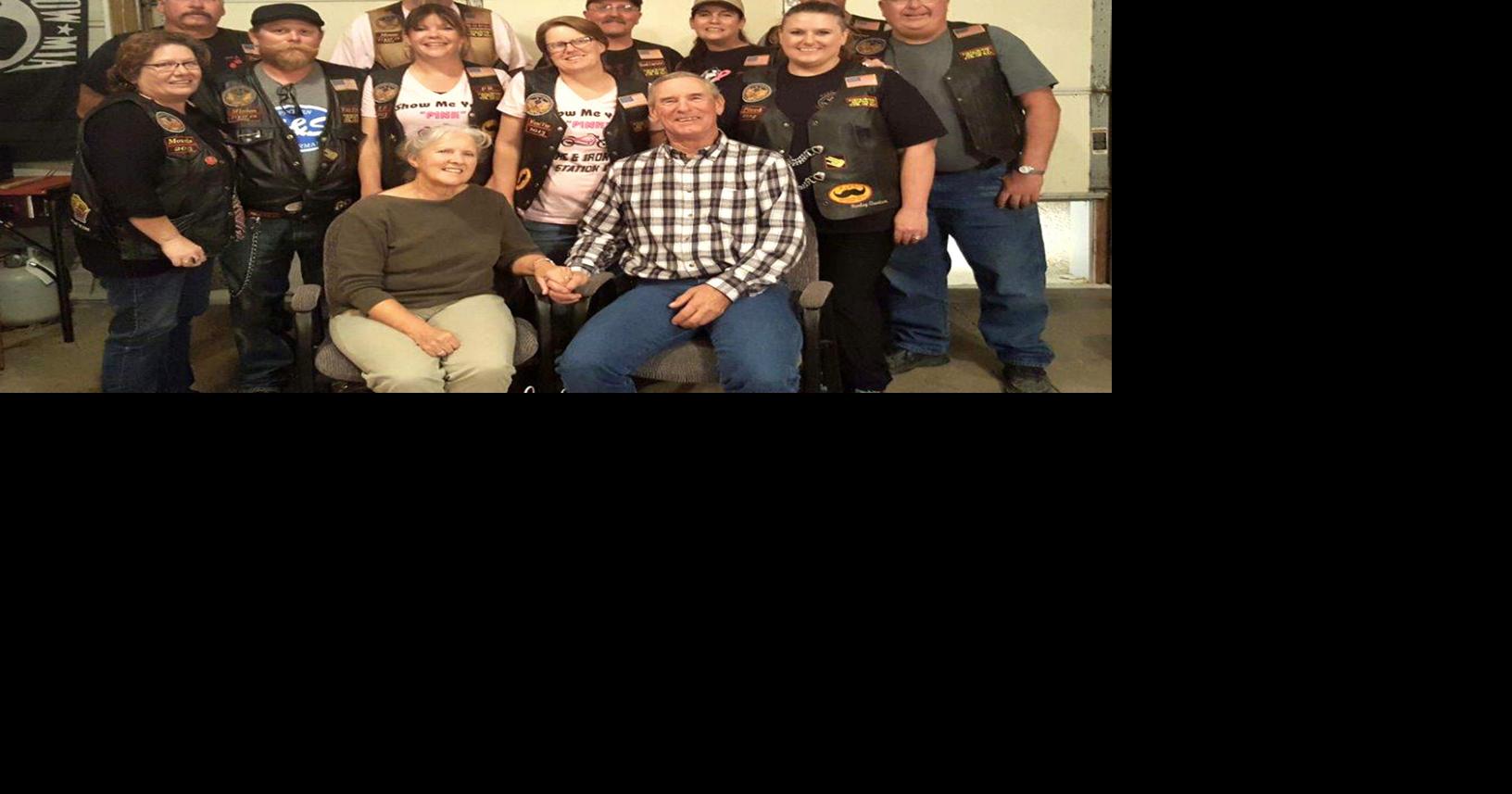 Firefighter motorcycle club passes check to cancer patient