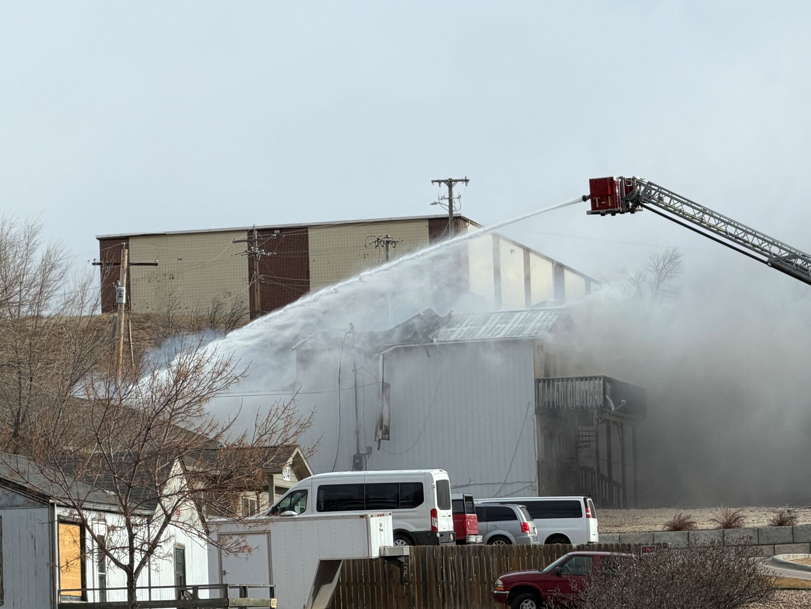 PHOTOS: Rapid City crews battle fire on Wright Street