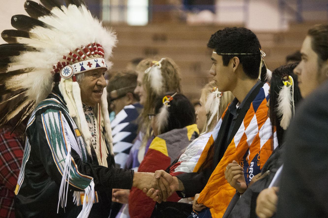 Feathering ceremony for Native American graduating seniors