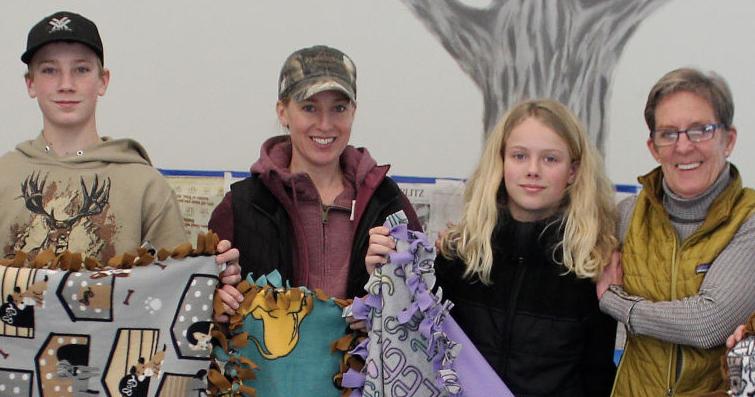 Three local groups craft blankets for Humane Association pets