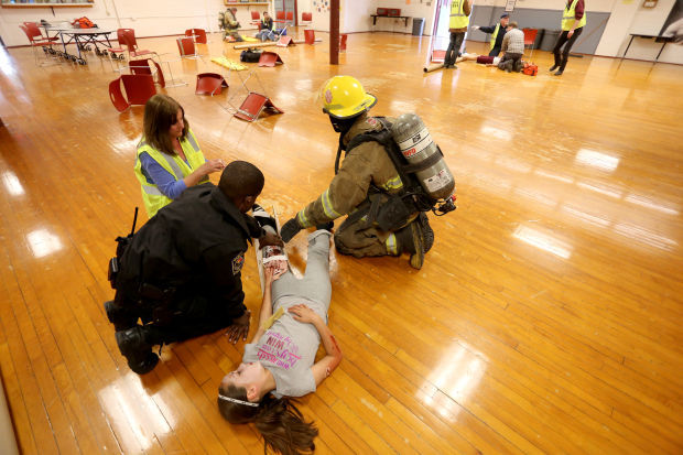 Practice drill: Emergency responders conduct mock emergency