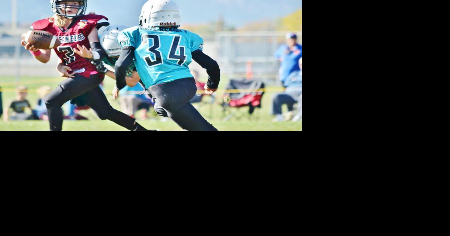 Throw like a girl: Youth football quarterback leads her team to the ...