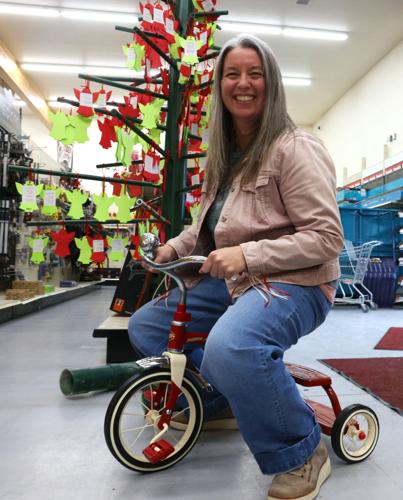 Angel tree, employee on trike