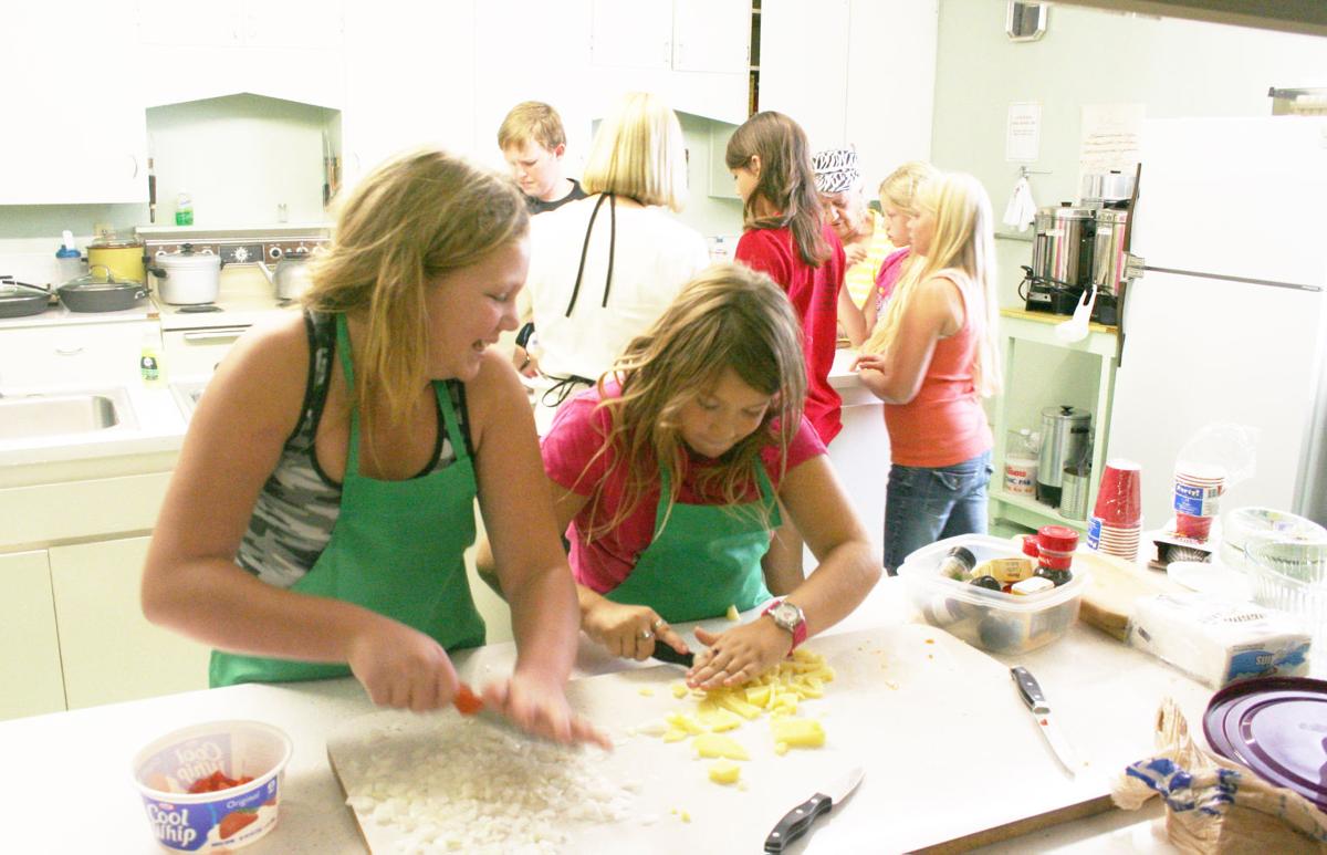 Global gourmets: Cooking club teaches students how to prepare exotic ...